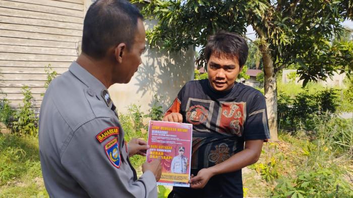 Satbinmas & Bhabinkamtibmas Polres Singkawang Ajak Warga Sedau Cegah Karhutla Lewat Edukasi ...