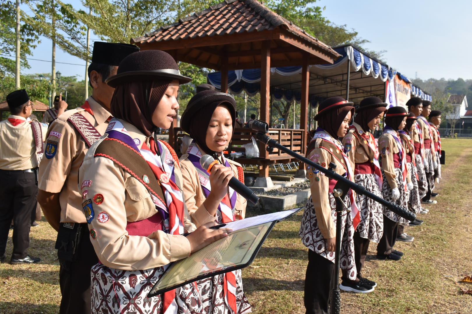 Bunyi Dwi Satya dan Dwi Darma Pramuka, Lengkap dengan Contoh Pengamalannya - TribunNews.com